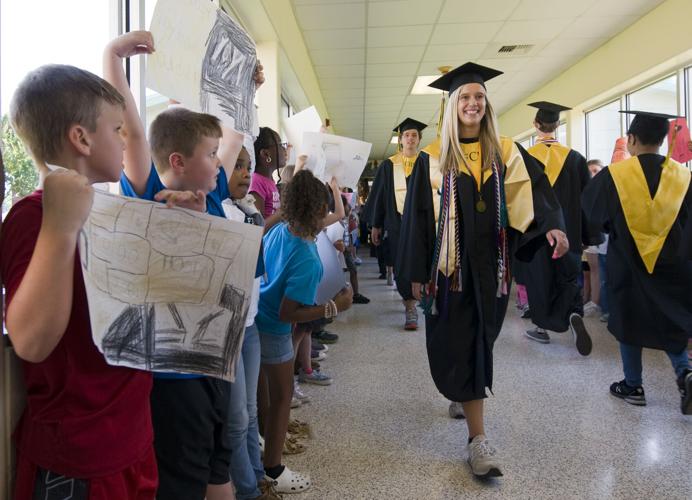A walk down memory lane: Farmville seniors revisit schools where their ...