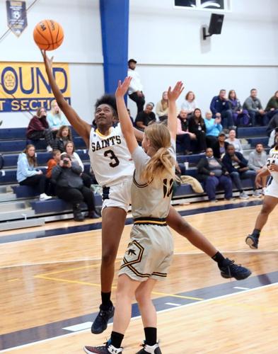 High School Basketball: Saints sweep Falcons in home opener | High ...