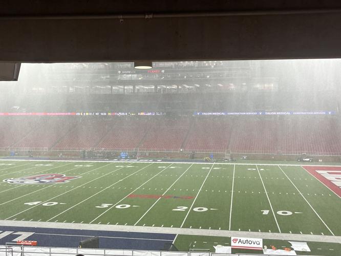 ECU football: Fans bide time during long delay waiting for Pirates to ...