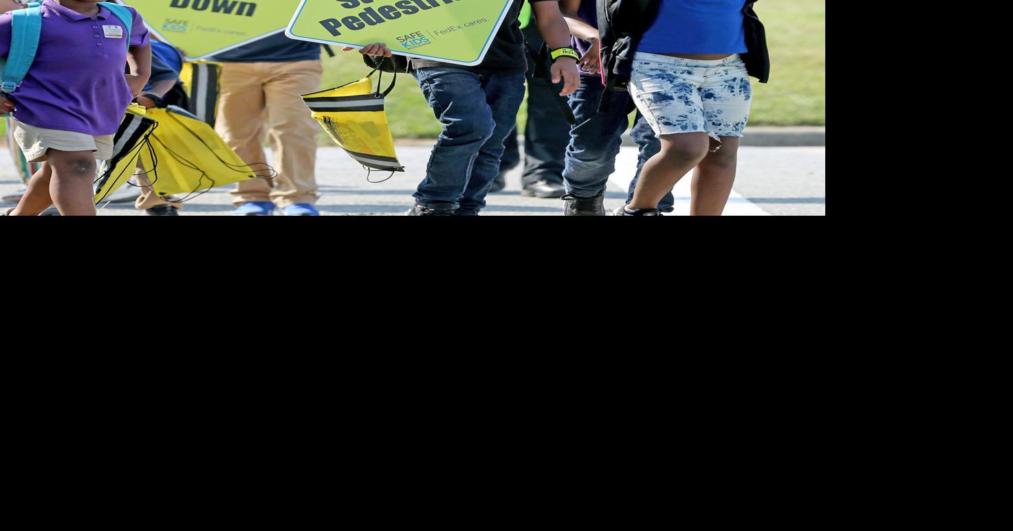 ECU Community School celebrates international walk to school day ...