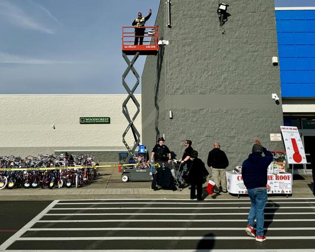 Police go high to lift sprits: Cops on the Roof collects Christmas ...