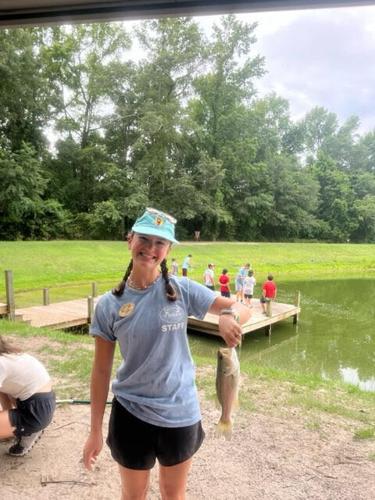 counselor with fish | | reflector.com