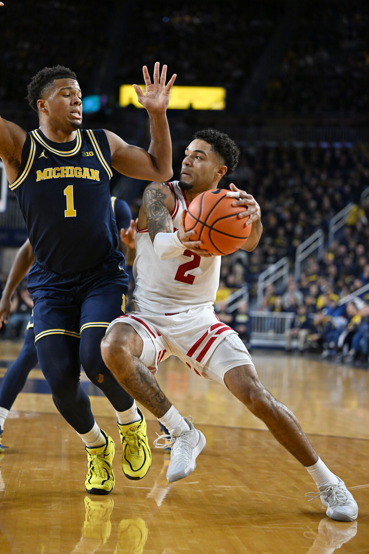 Top 25 Roundup: Wisconsin hands No. 2 Michigan its first loss, 91-88 ...