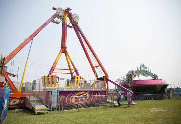 Fairly early arrival: Rides herald county fair | Local News | reflector.com