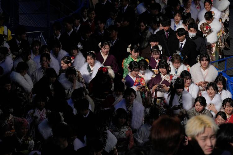 Photos of 20-year-olds at a Coming of Age Day ceremony in Japan ...