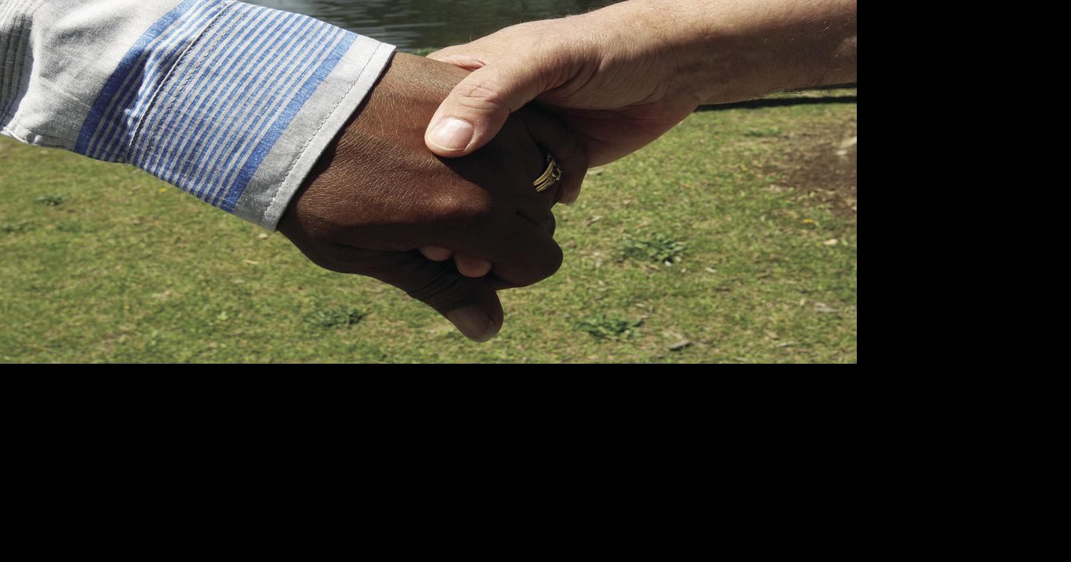 Crowd links hands for life | Local News | reflector.com