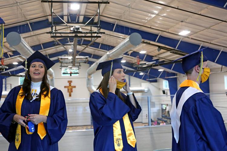 High school graduations begin with masks, social distancing | Local ...