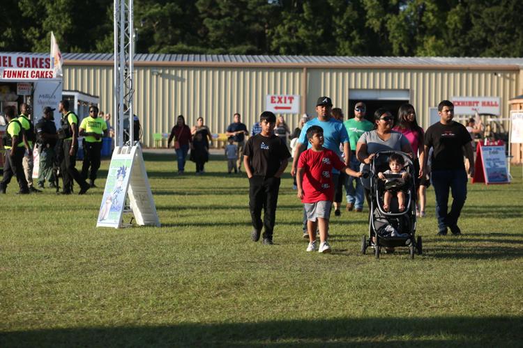 Tradition lures fair fans by the carload: Visitors, guests celebrate ...