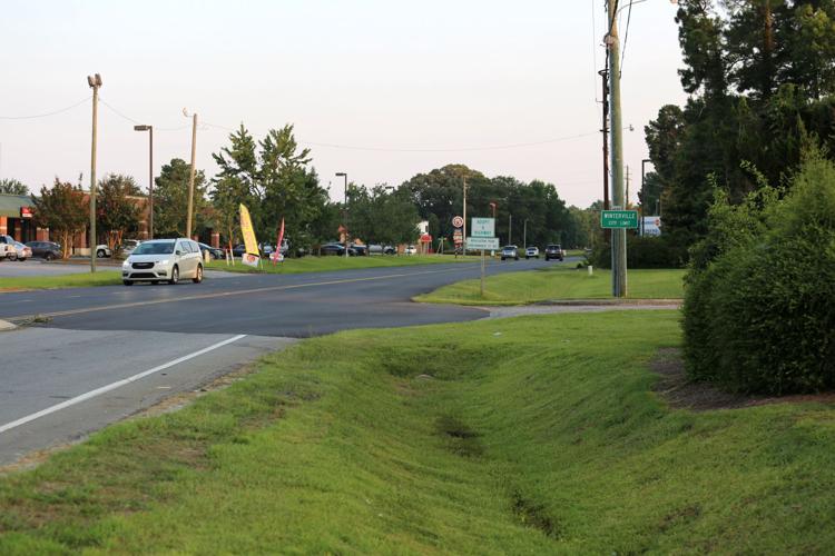 Utility contract ‘milestone’ for Evans-Old Tar widening project ...