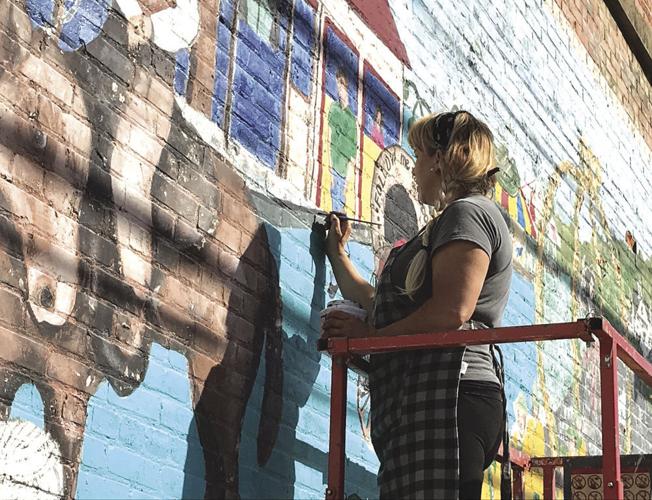 Local artist Lisa Koonce plans to finish repainting the mural for the ...