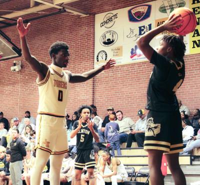 James Kenan Dominates Clinton with Stifling Defense in 74-48 Win ...