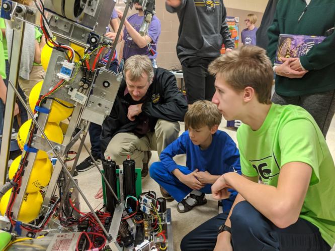 Students learn 21st century skills through robotics | Feature Story ...