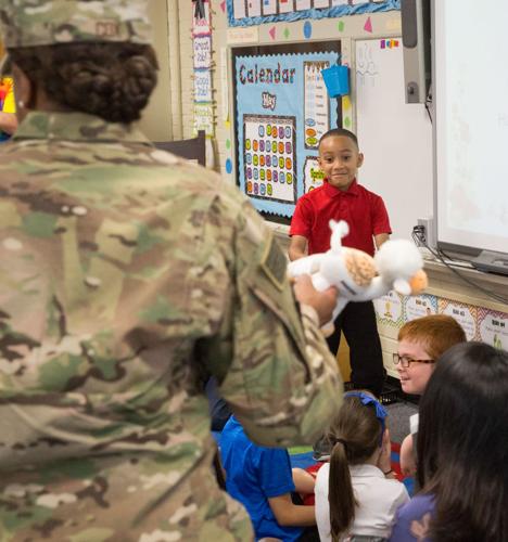 Mother of all surprises: Military mom returns from deployment to ...