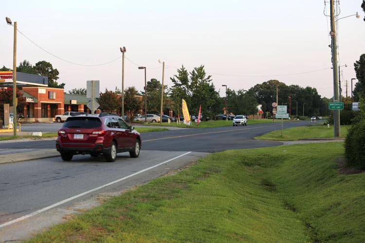 Utility contract ‘milestone’ for Evans-Old Tar widening project ...