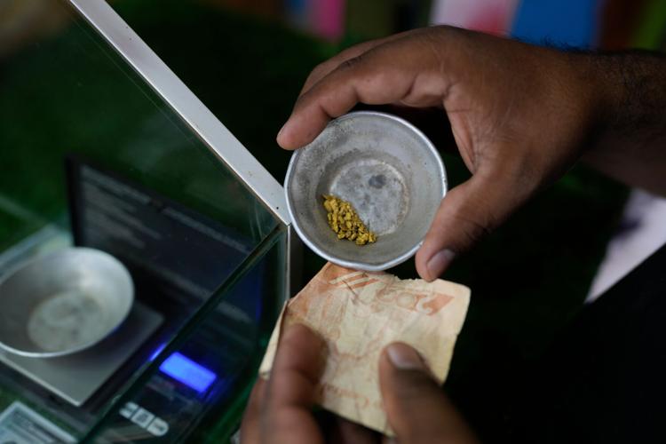 Photos show miners in El Callao, Venezuela, where gold has become an ...