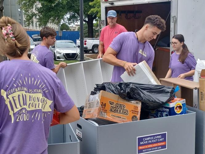 ECU welcomes 5,100 to campus; Hundreds of volunteers lend a hand during ...