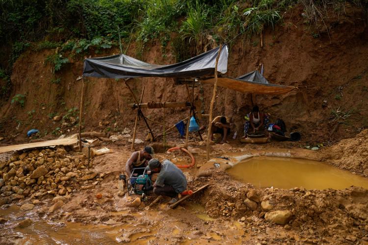 Photos show miners in El Callao, Venezuela, where gold has become an ...