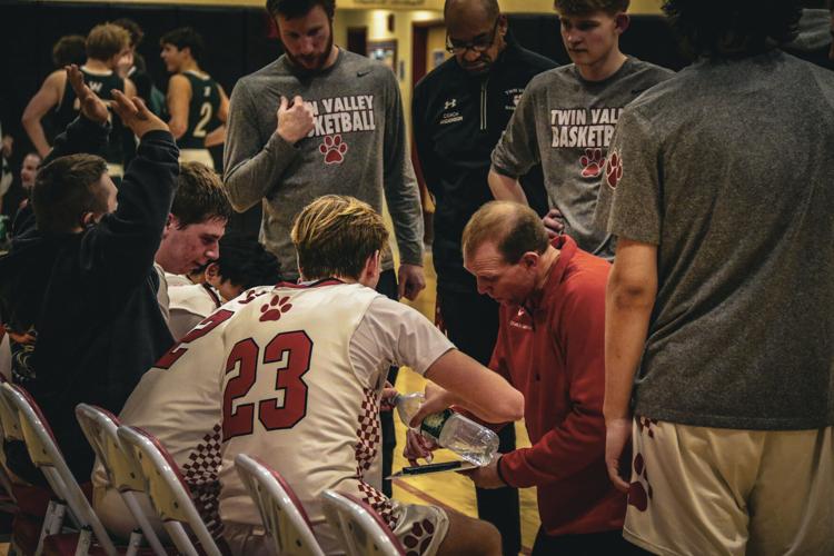 Brown's late game heroics lead Wildcats to wild win over Woodstock ...