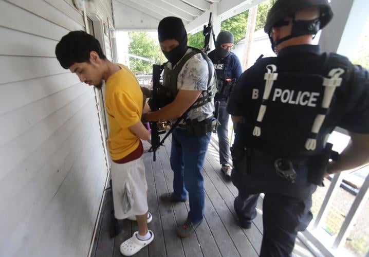 Simultaneous police drug raids net gangs, guns and cash in Bennington ...