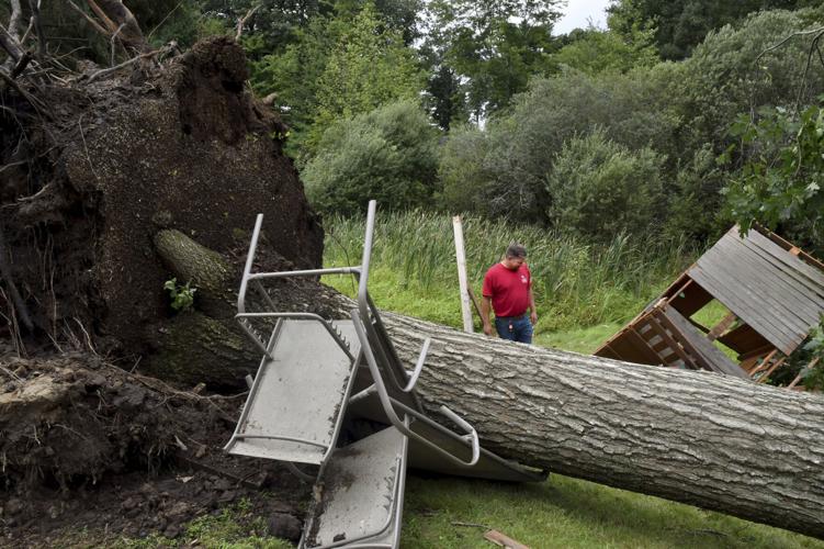 Rhode Island tornado lifts car as New England storms damages homes ...