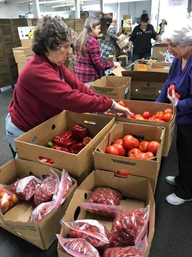 Project Hand Up volunteers working to keep families fed | Kent County ...