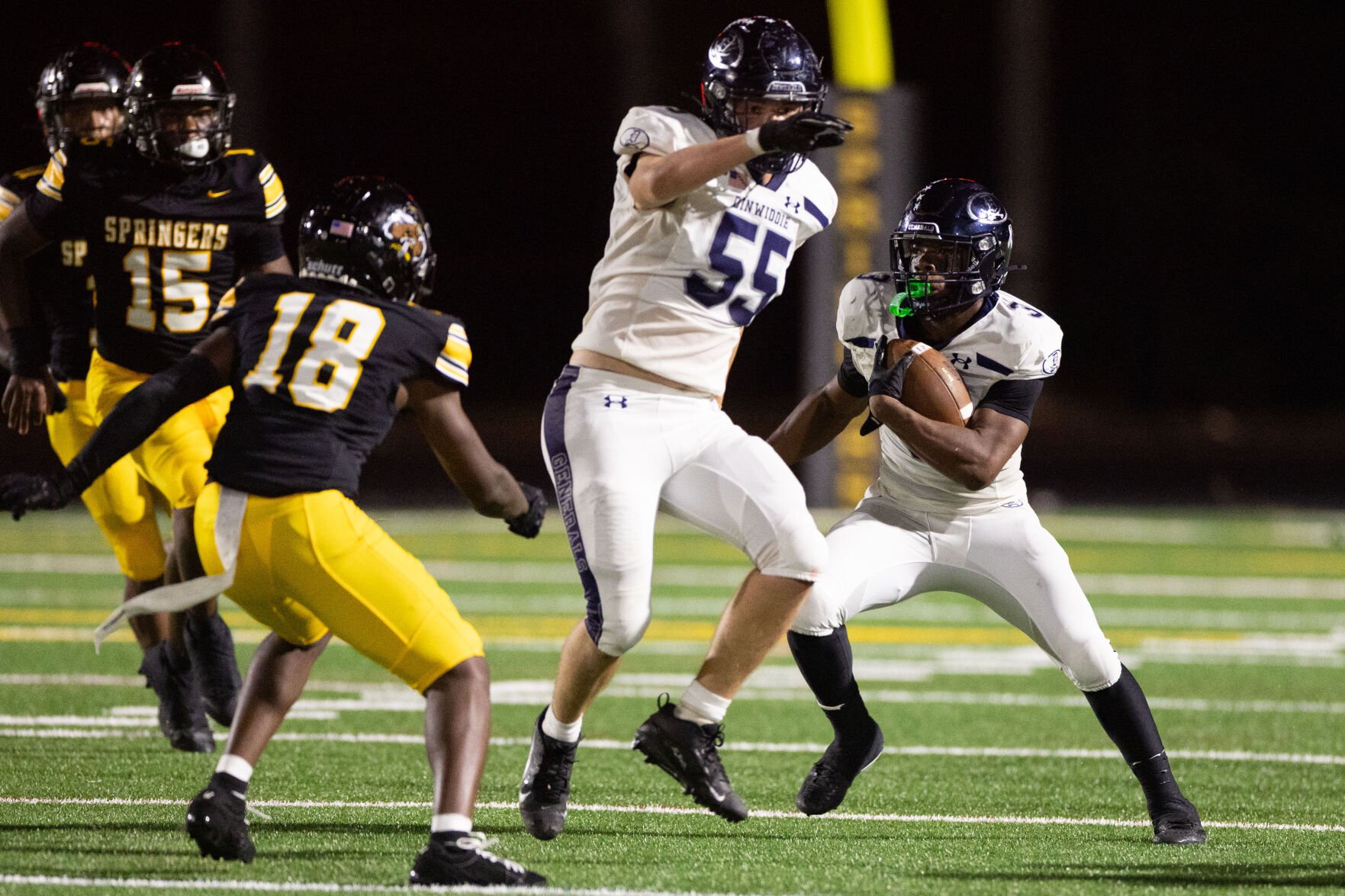 PHOTOS: Dinwiddie football defeats Highland Springs in overtime on the road