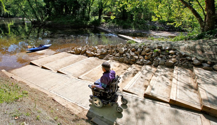 Wheelchair-accessible kayak ramp opens
