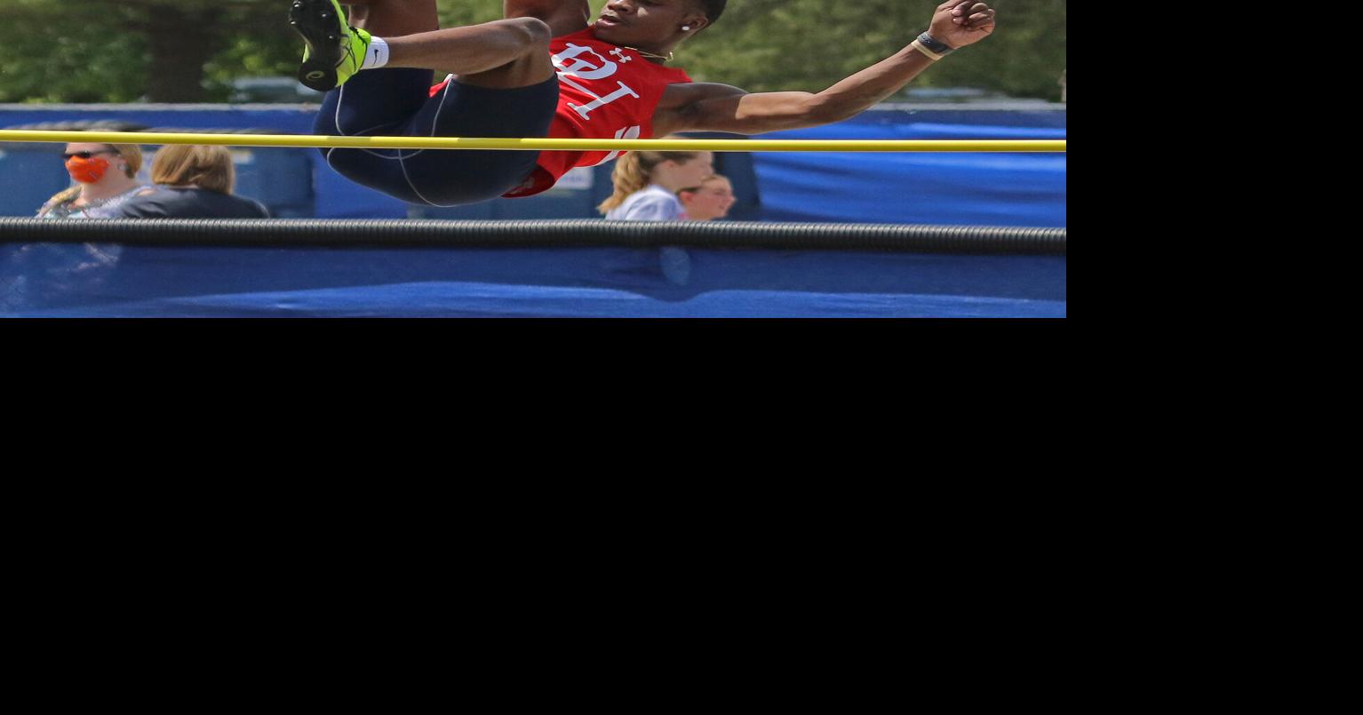 Mines ties for high jump win