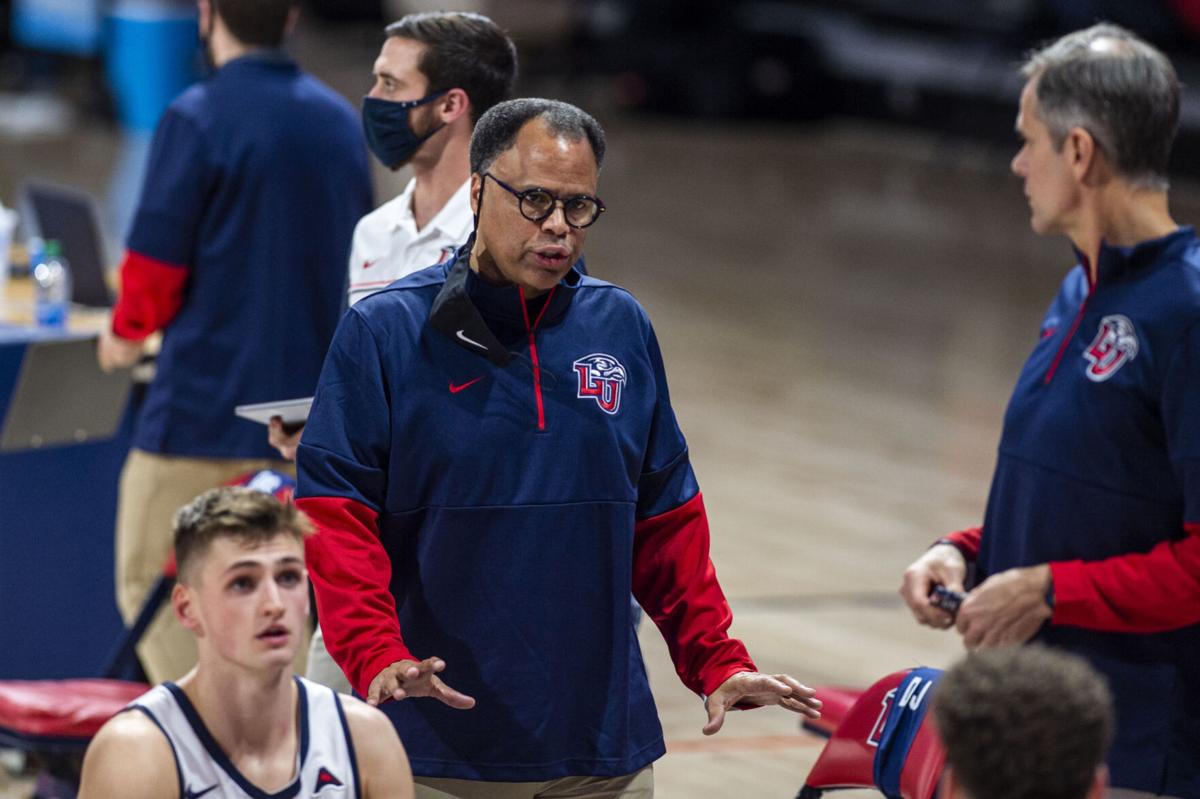 While filling in for COVID-positive boss, Liberty basketball assistant ...