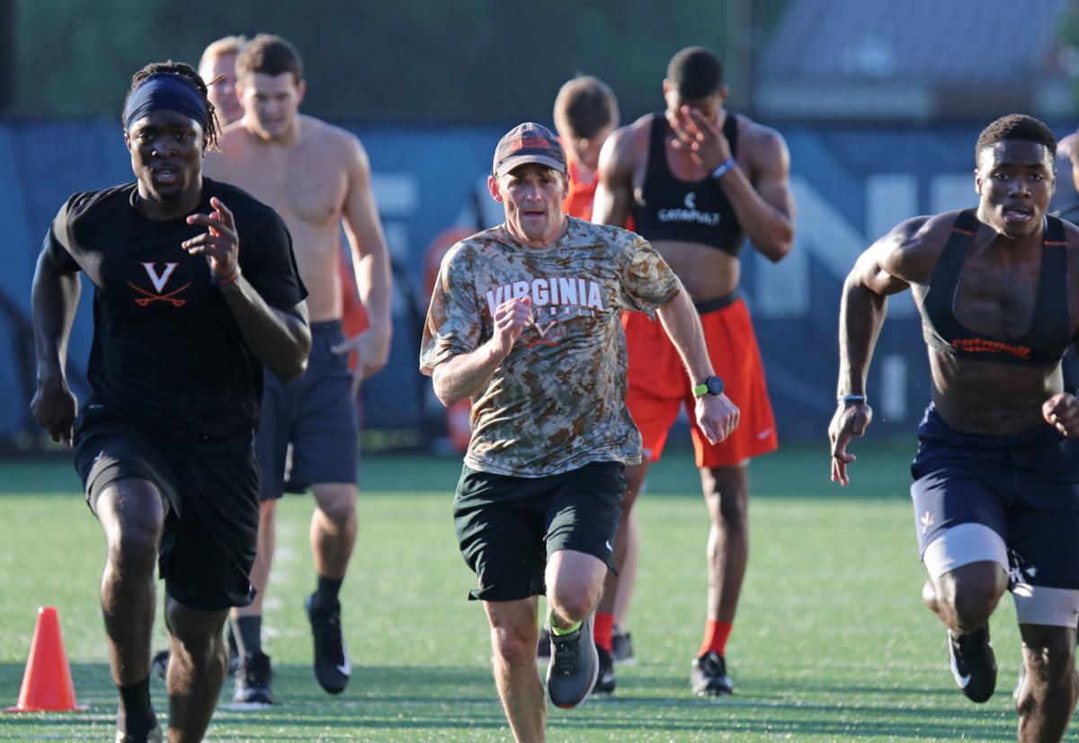 UVA President Jim Ryan joins football team for a summer conditioning ...