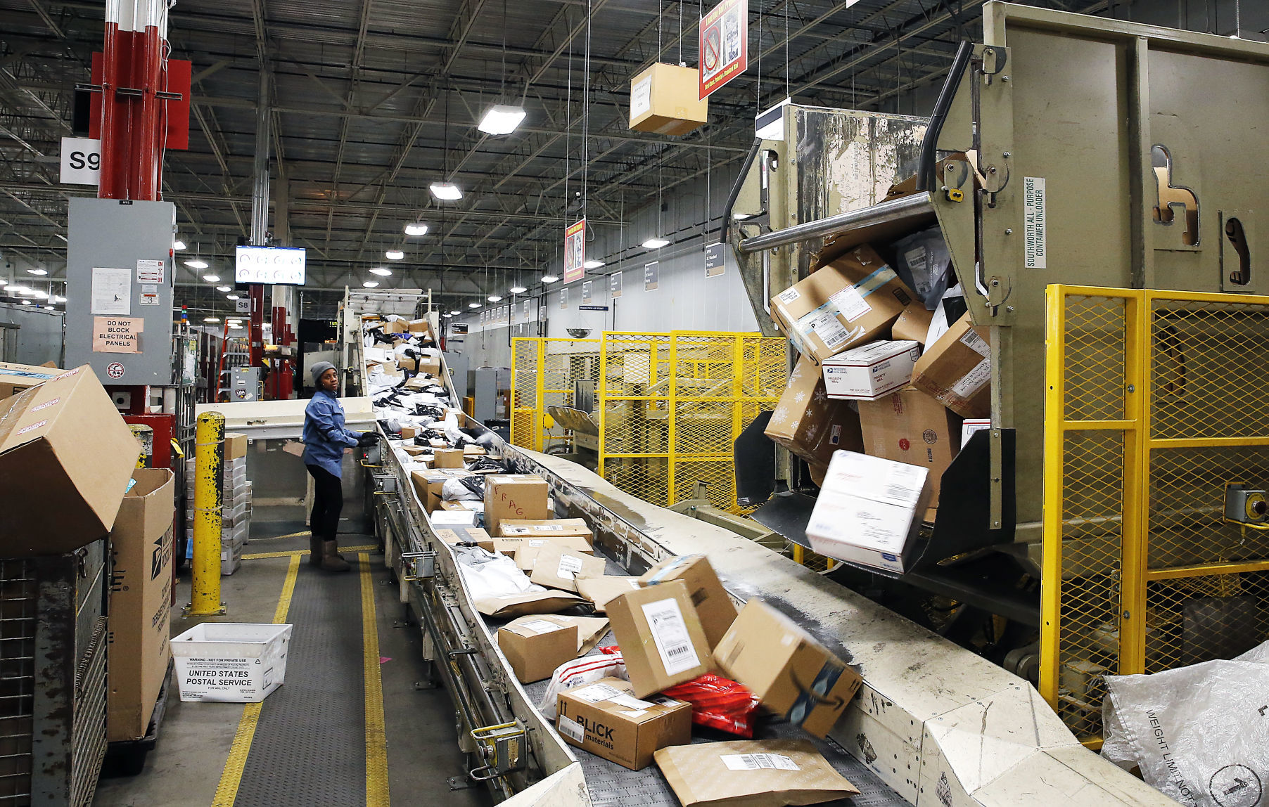 USPS Richmond hub ramps up holiday package push despite mail delays