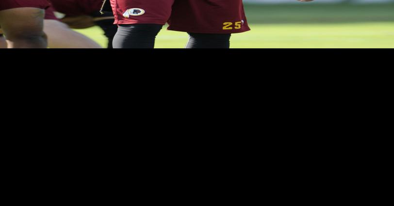 Redskins safety Ryan Clark playing with torn biceps