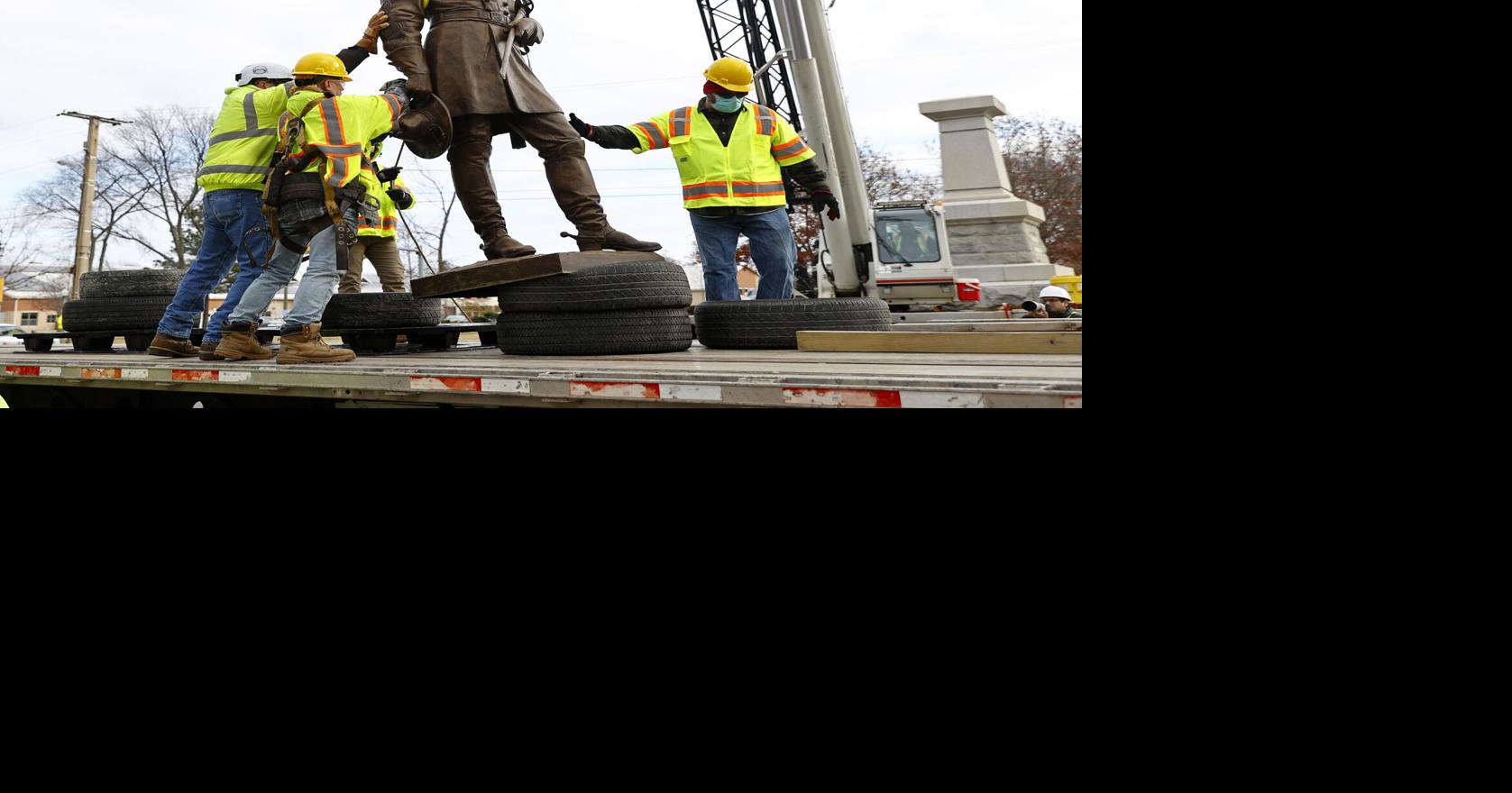 PHOTOS: Crews remove A.P. Hill statue