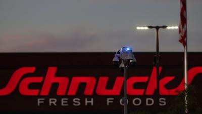 Man flashes gun at grocery store employee over self-checkout