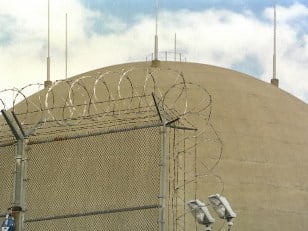 Power in Surry nuclear unit throttled back for repairs