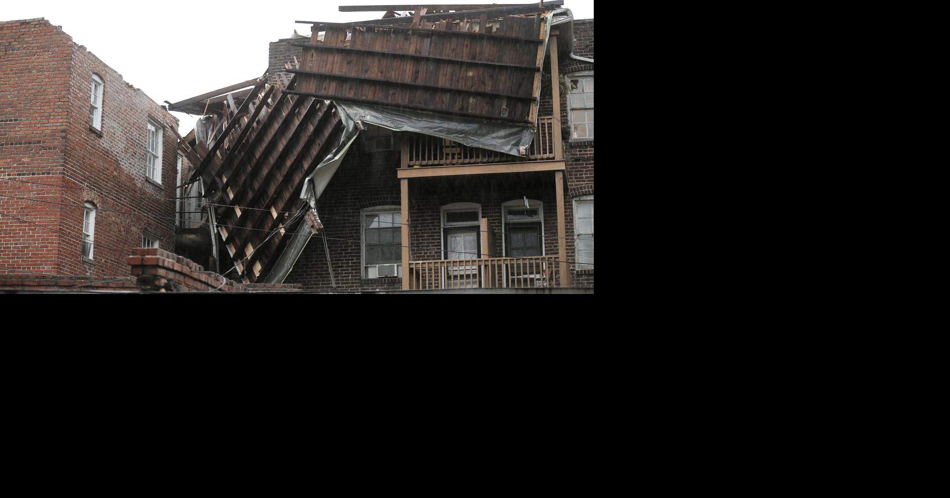 PHOTOS: Roof ripped off of apt. building during storm