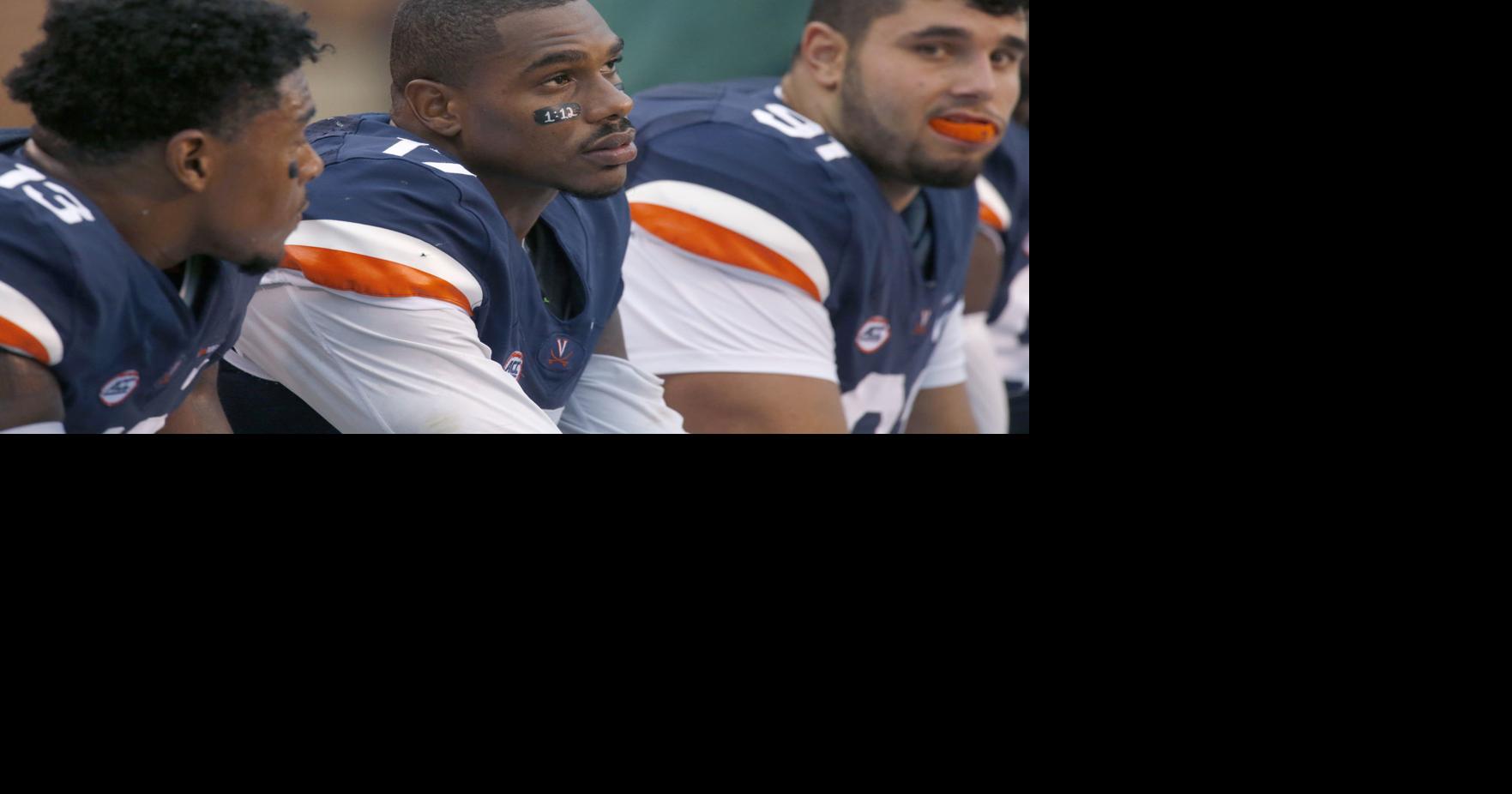 UVA starting linebacker Malcolm Cook made it out of Mosby Court, but he ...