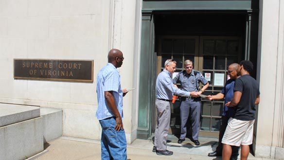 Family of Powhatan man stabbed in the head leads march in downtown Richmond