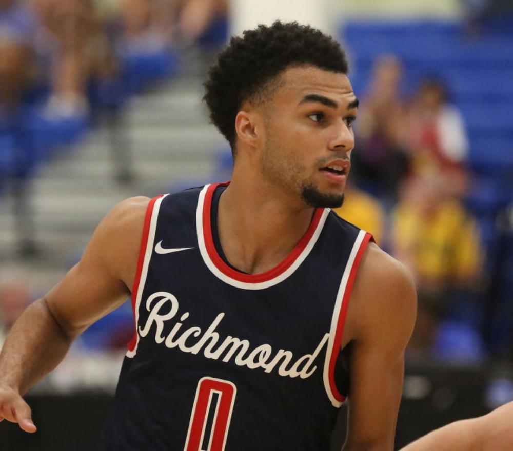 Jacob Gilyard's on-the-job training continues as Spiders take on ...