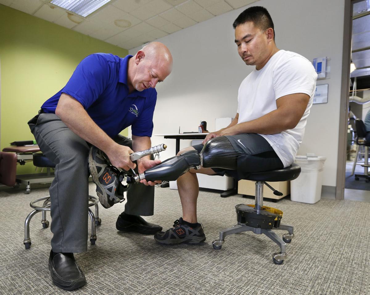 PHOTOS: Prosthetist, paraolympian, coach and amputee