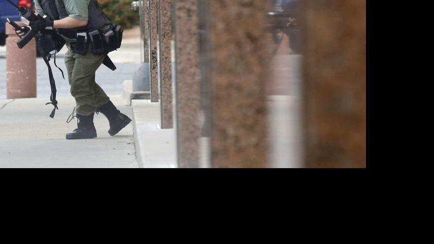 PHOTOS: Heavily armed, masked gunman killed outside Dallas courthouse ...