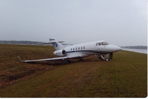 Private jet with 5 people aboard slid into ditch at RIC after landing ...