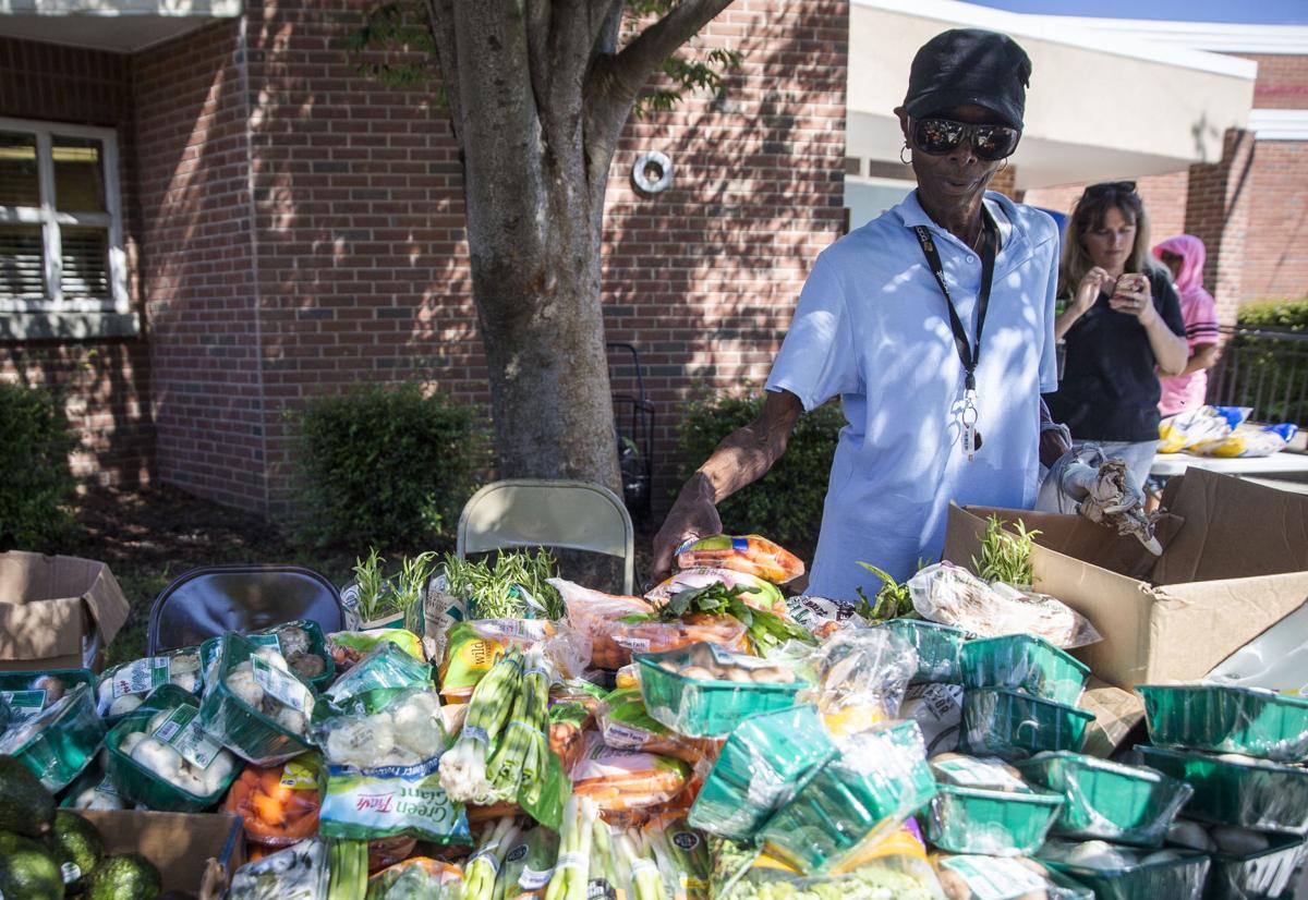 PHOTOS: Gilpin Court senior residents receive new A/C units