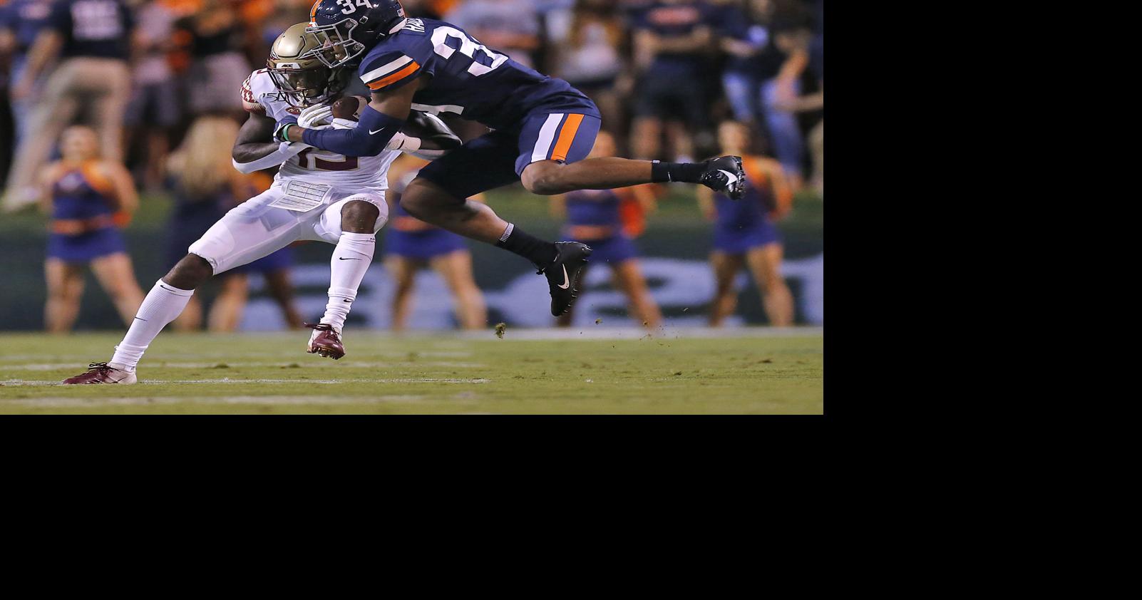 Injured All-American Bryce Hall has become a mentor to his UVA teammates