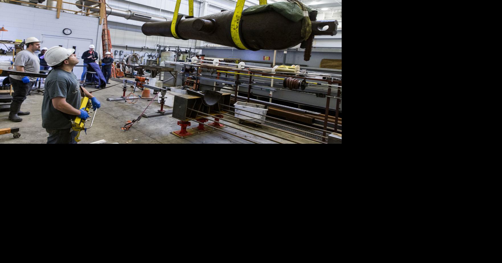 PHOTOS: The bore of one of two guns of the USS Monitor is cleaned out ...