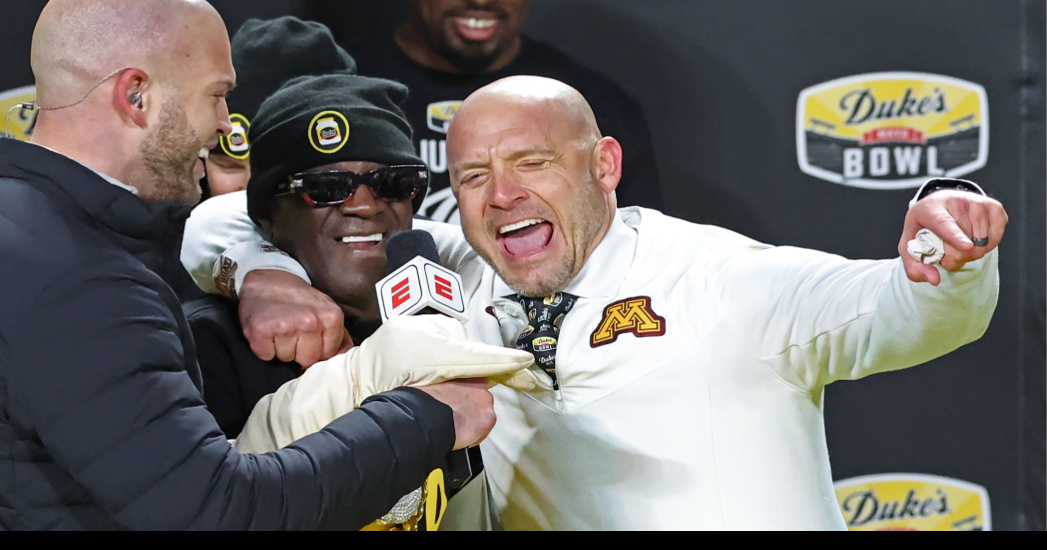 WATCH: Rapper Flavor Flav helps douse Minnesota coach PJ Fleck at the ...