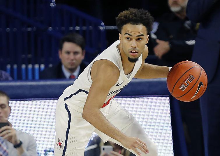 In Spiders' hoops revival, Jacob Gilyard manages a winning operation ...