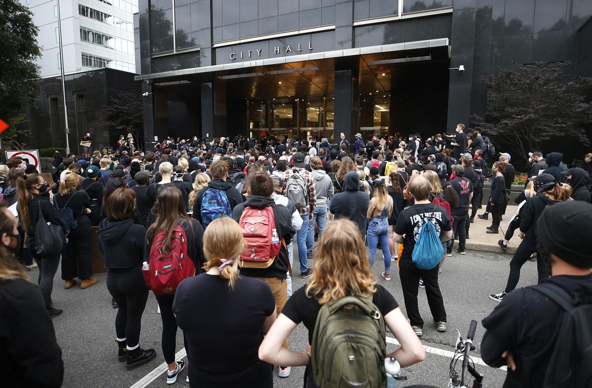 PHOTOS: Protesters march to City Hall, June 15