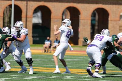 Tabling full-time job in financial advising for now, JMU quarterback ...