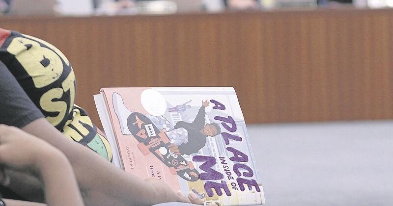 Board keeps contested book in school libraries